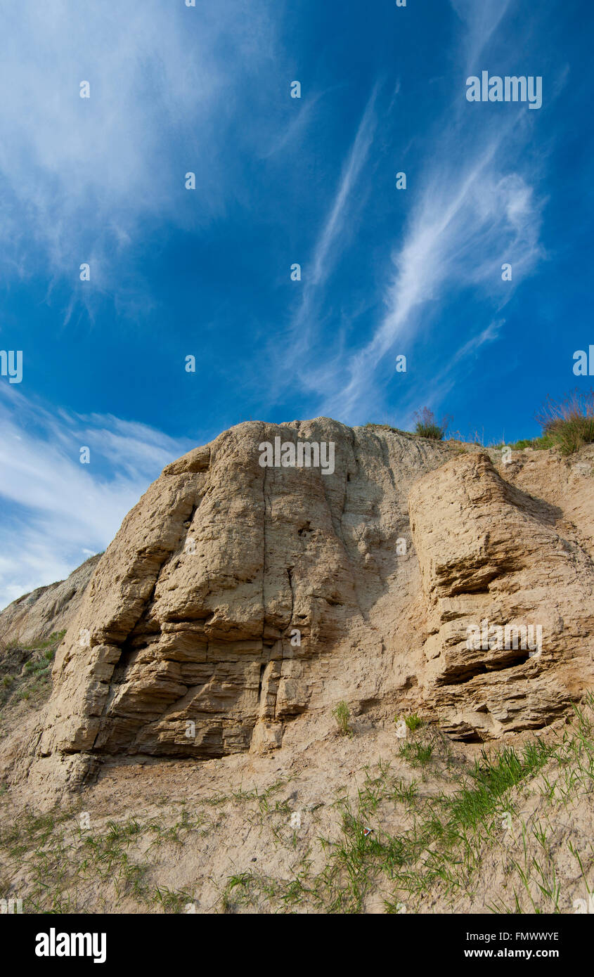 sandy rock on sky background Stock Photo - Alamy
