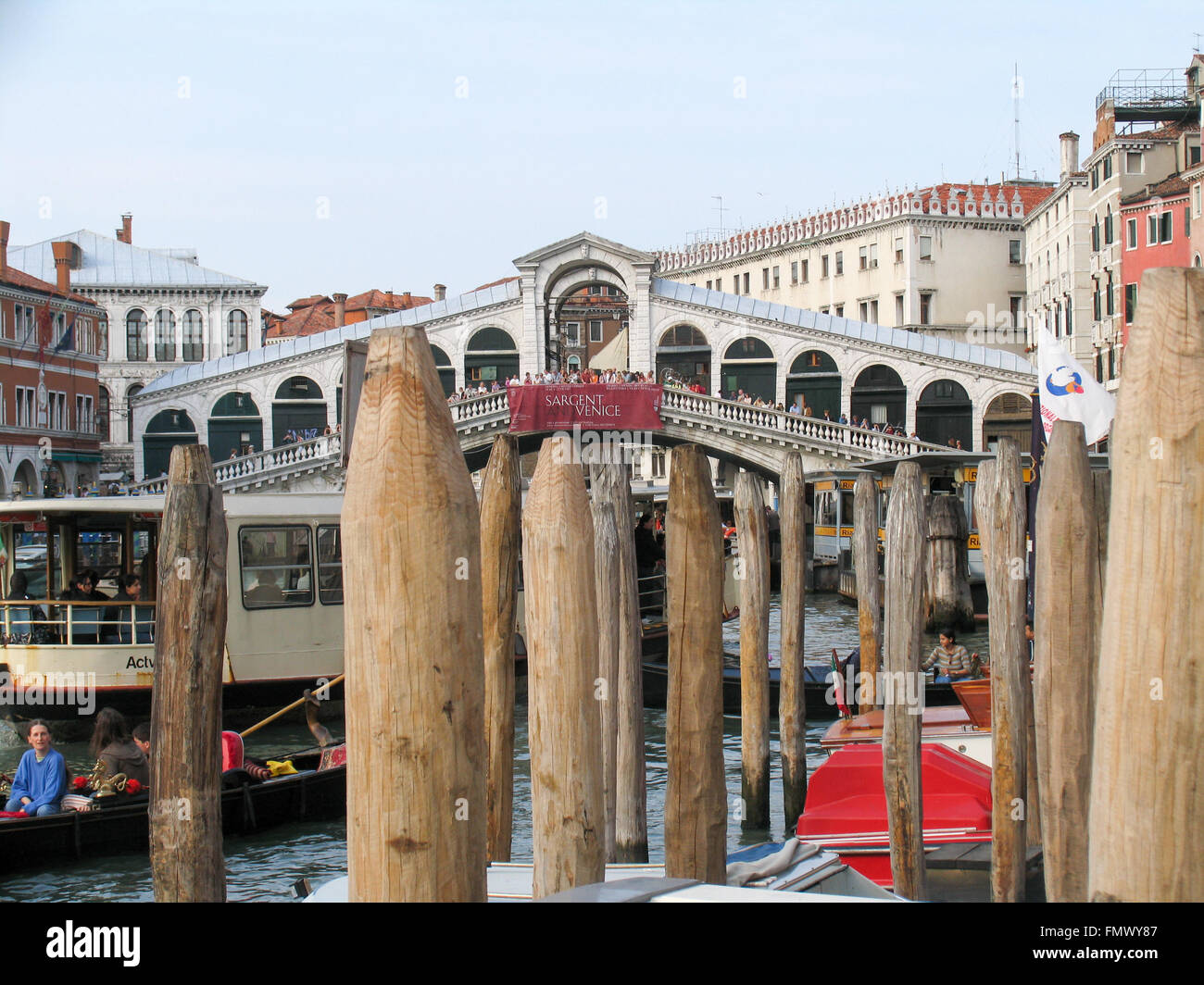 Wooden pile moorings in front of the Rialto Bridge, Venice Stock Photo ...