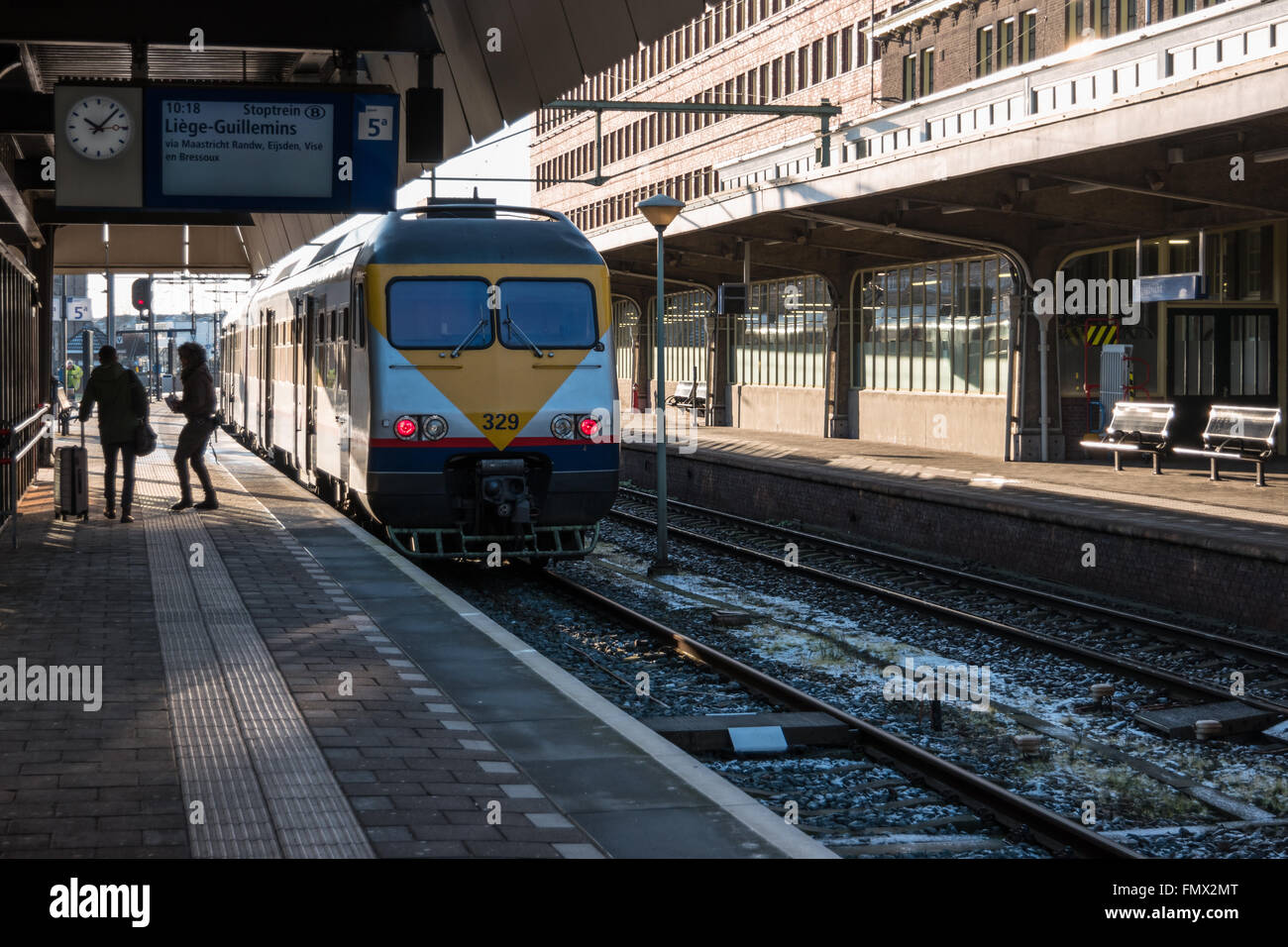 A passenger train. The main railway station of Maastricht. Railway ...
