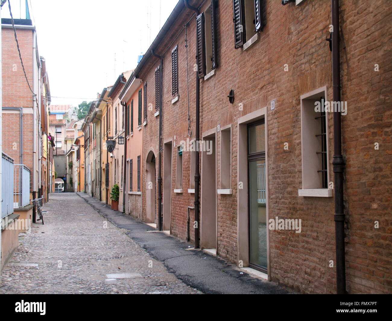 A row of houses in a narrow lane way Stock Photo - Alamy