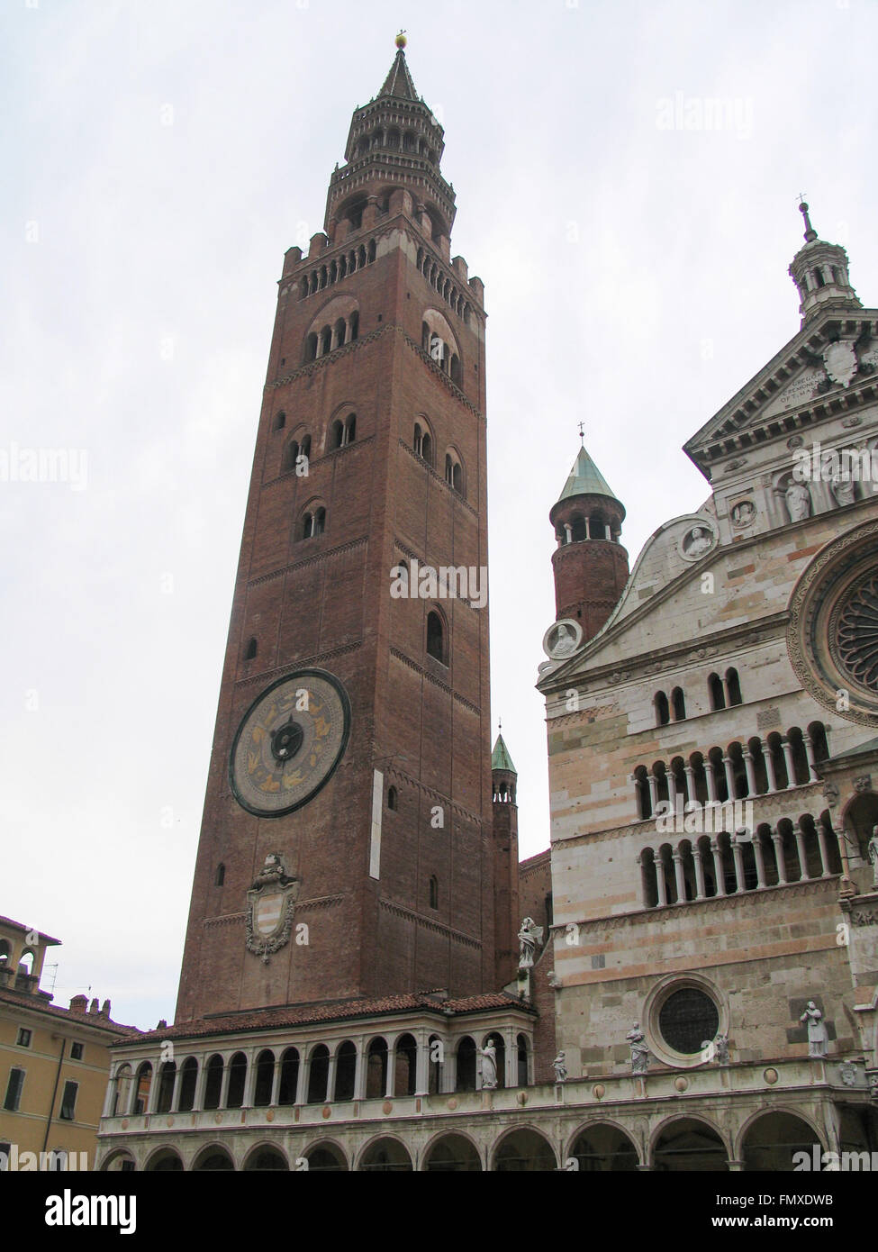 The brick tower, Torrazzo, and facade of Cathedral of Cremona Stock ...