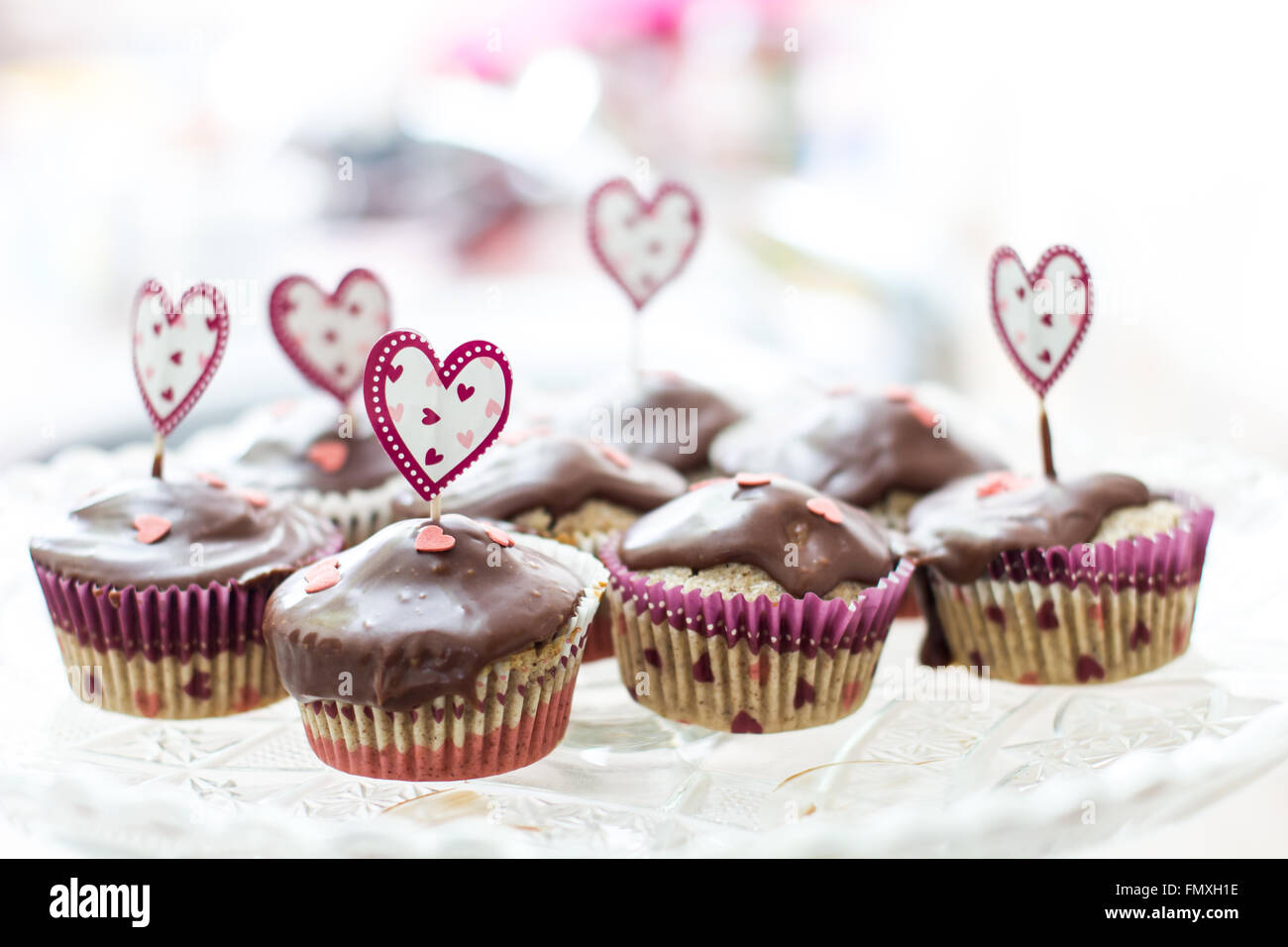 Chocolate muffin with topping, Valentine love dessert Stock Photo - Alamy