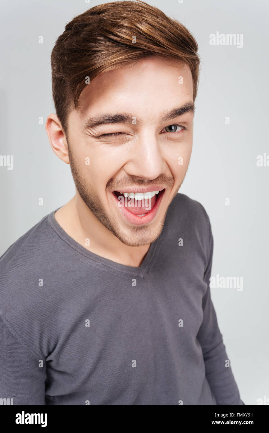 Portrait happy winking man over hi-res stock photography and images - Alamy