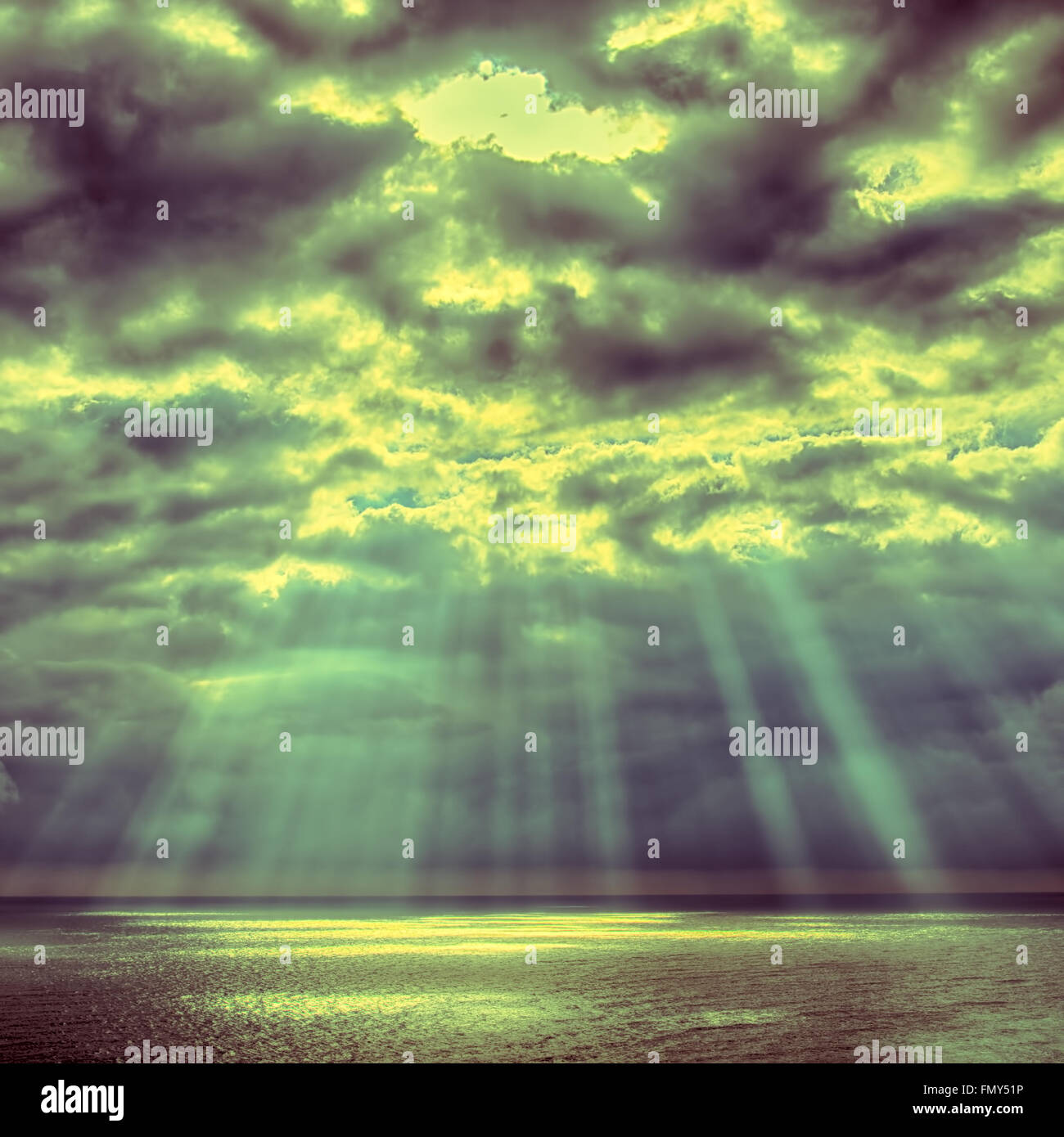 Seascape-Sunbeams shine through the clouds and reflected in the sea.HDR ...