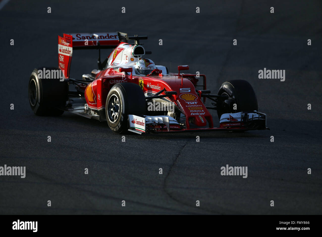 German Formula One driver Sebastian Vettel of Ferrari steers his car ...