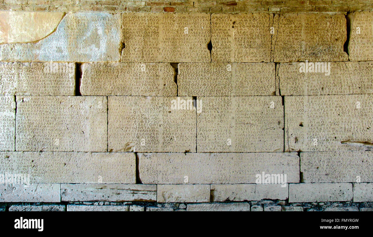 Scripted ancient wall Stock Photo - Alamy