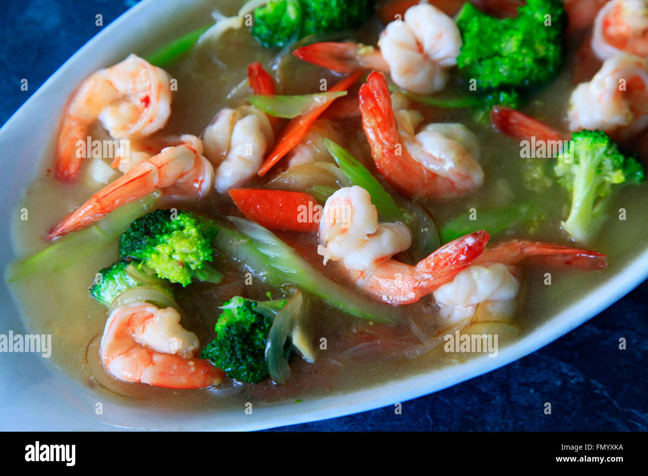Prawn in sauce with a vegetables Stock Photo - Alamy