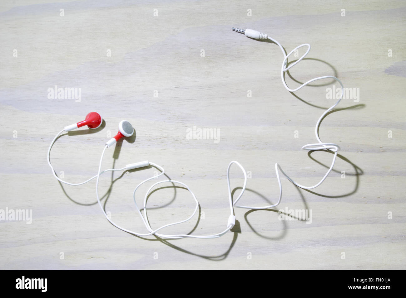 Wire phone ear hi-res stock photography and images - Alamy