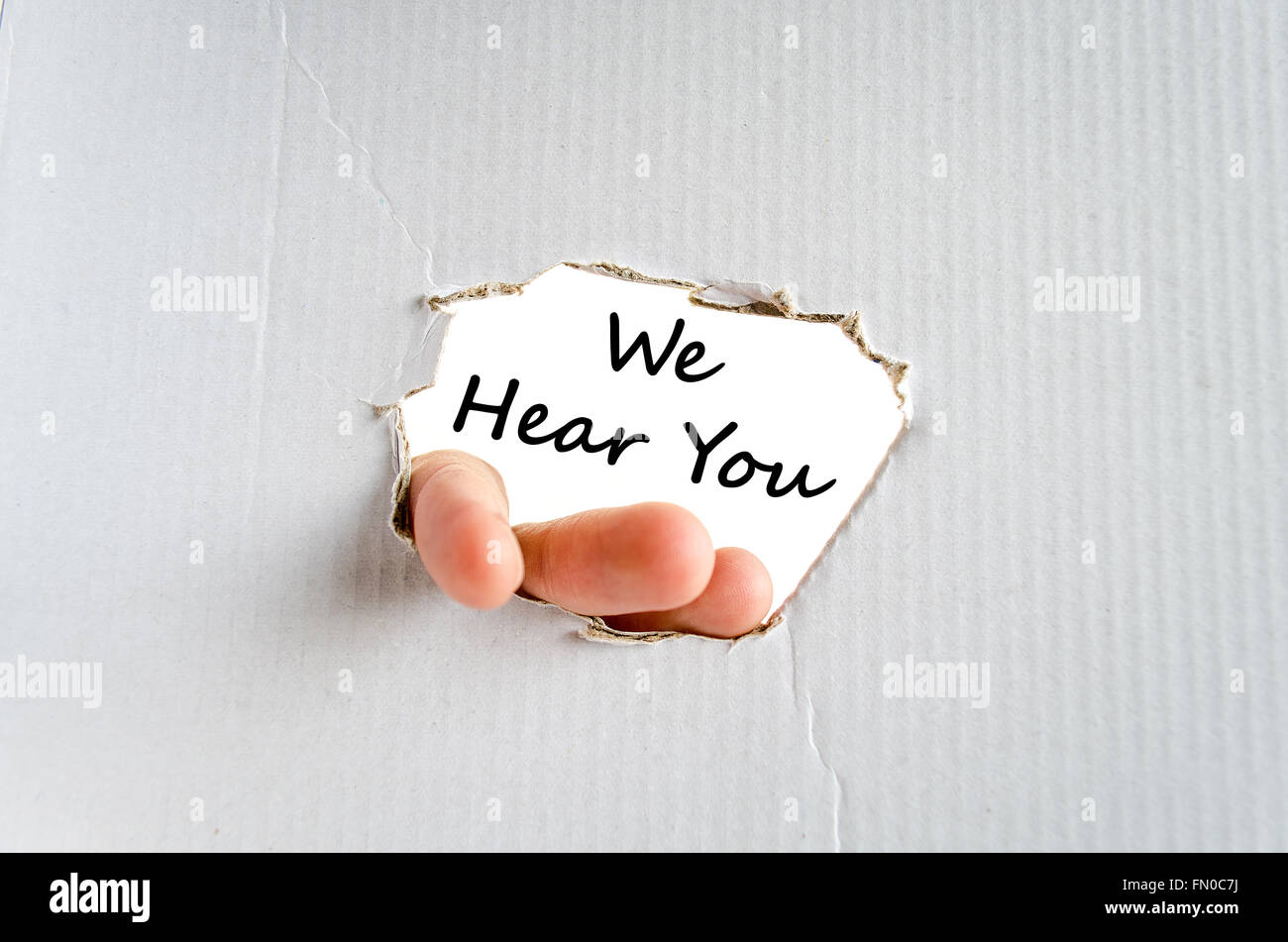 We hear you text concept isolated over white background Stock Photo - Alamy