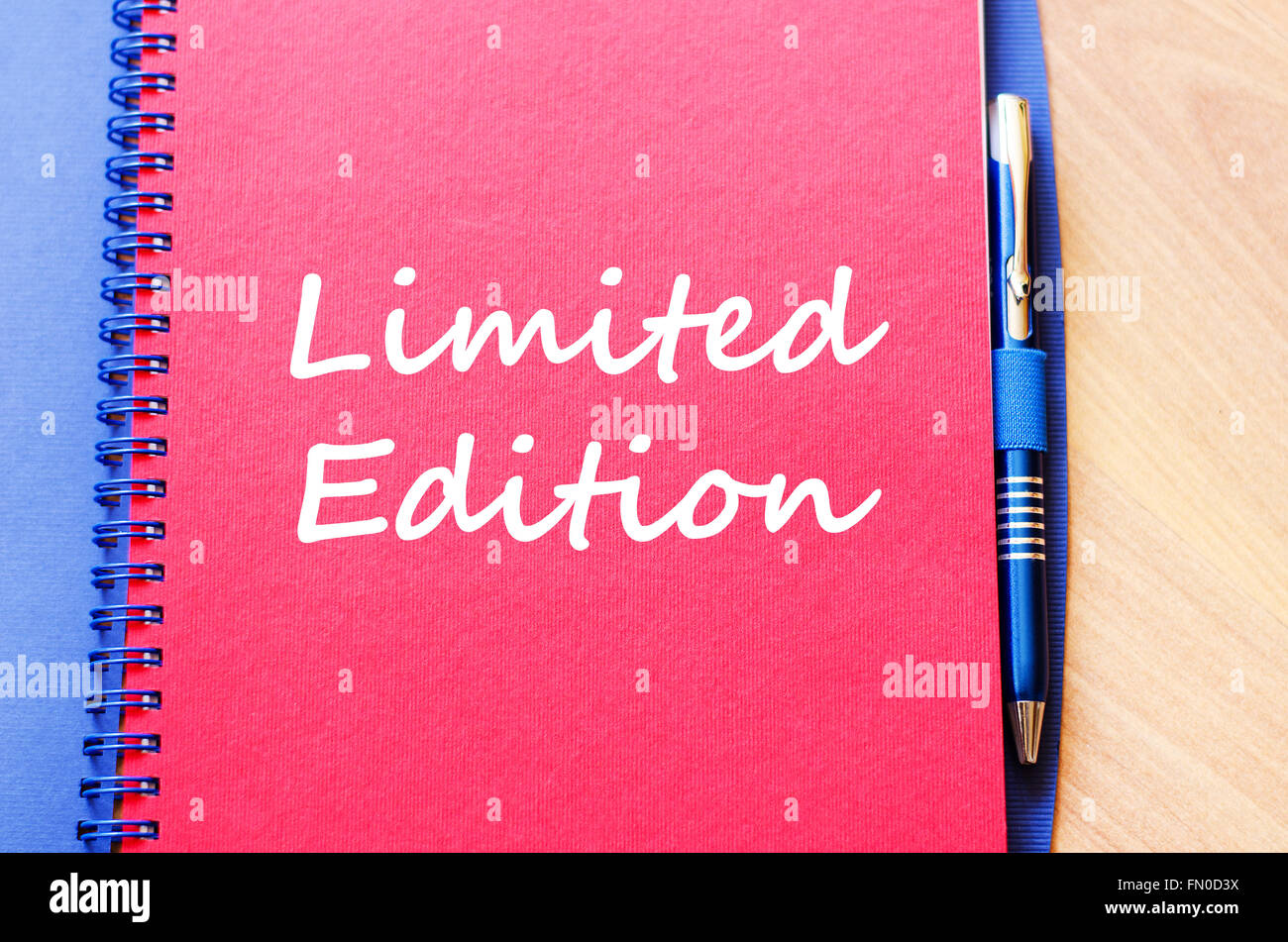 Limited edition text concept write on notebook with pen Stock Photo - Alamy
