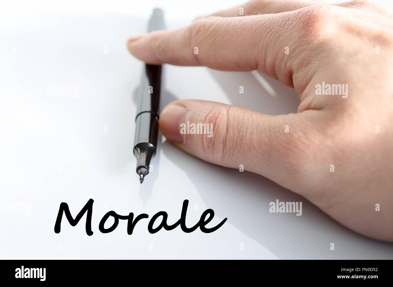 Morale text concept isolated over white background Stock Photo - Alamy
