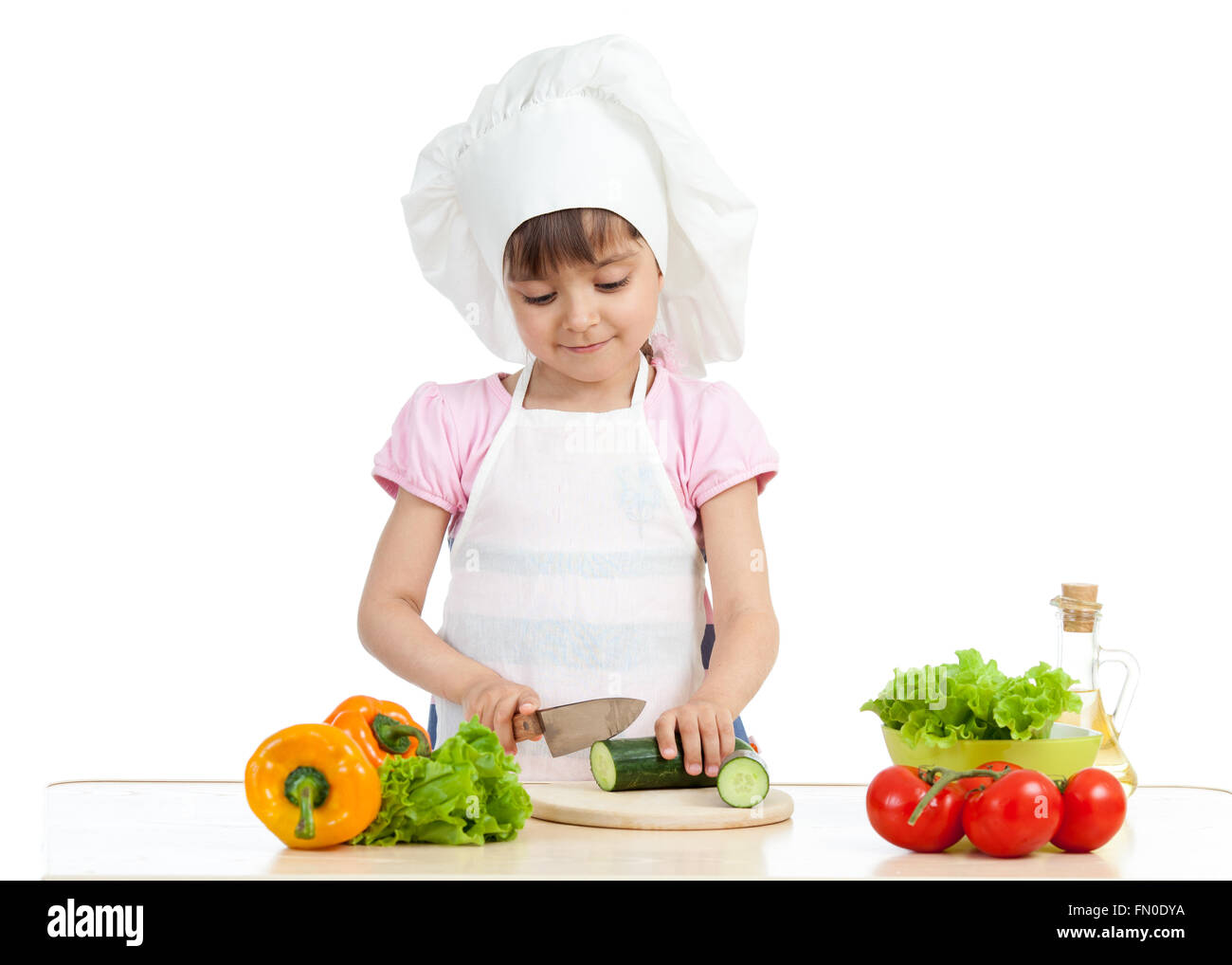 Chef kid preparing healthy food Stock Photo - Alamy