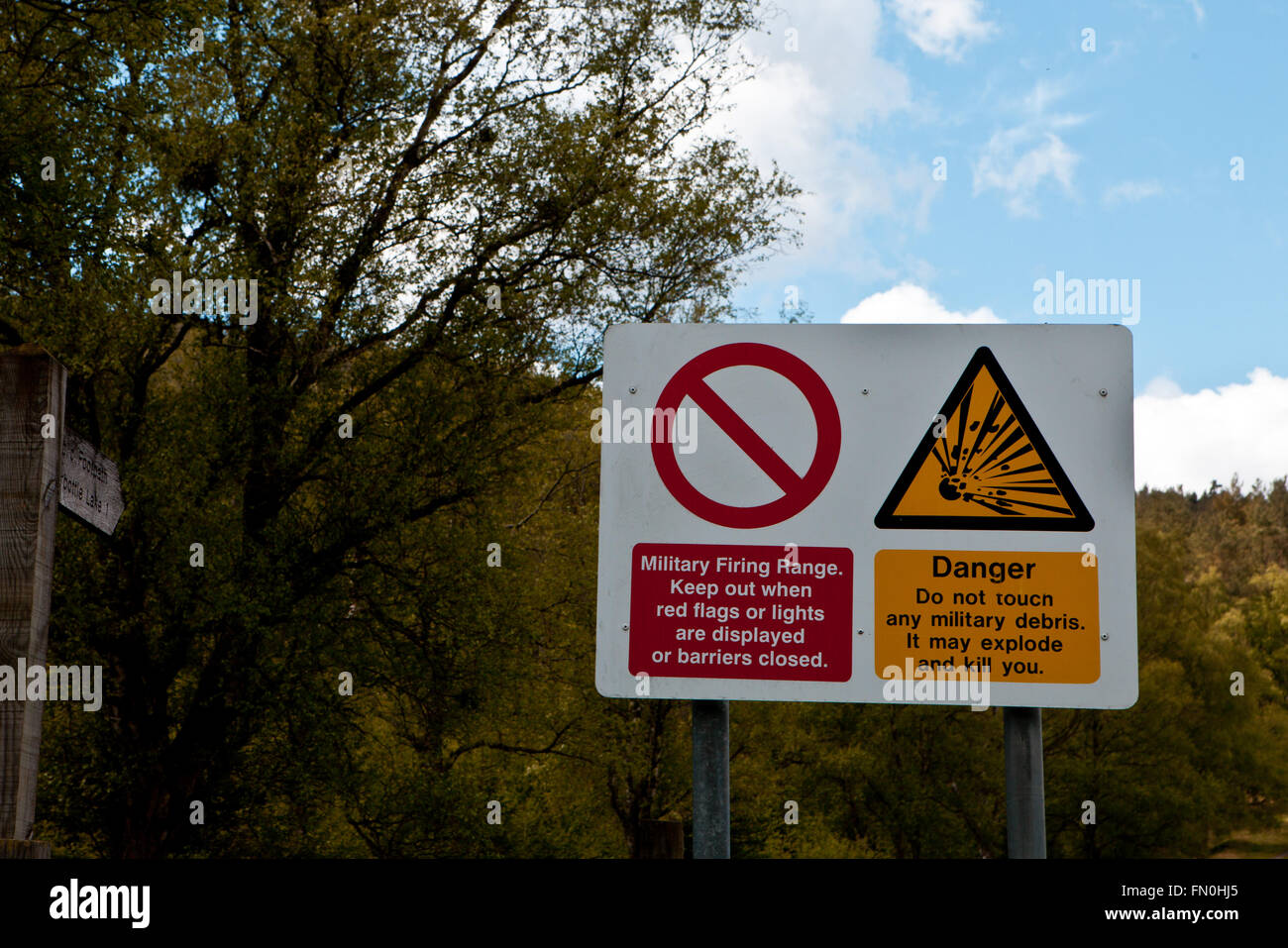 Danger sign warning of MOD debris Stock Photo - Alamy