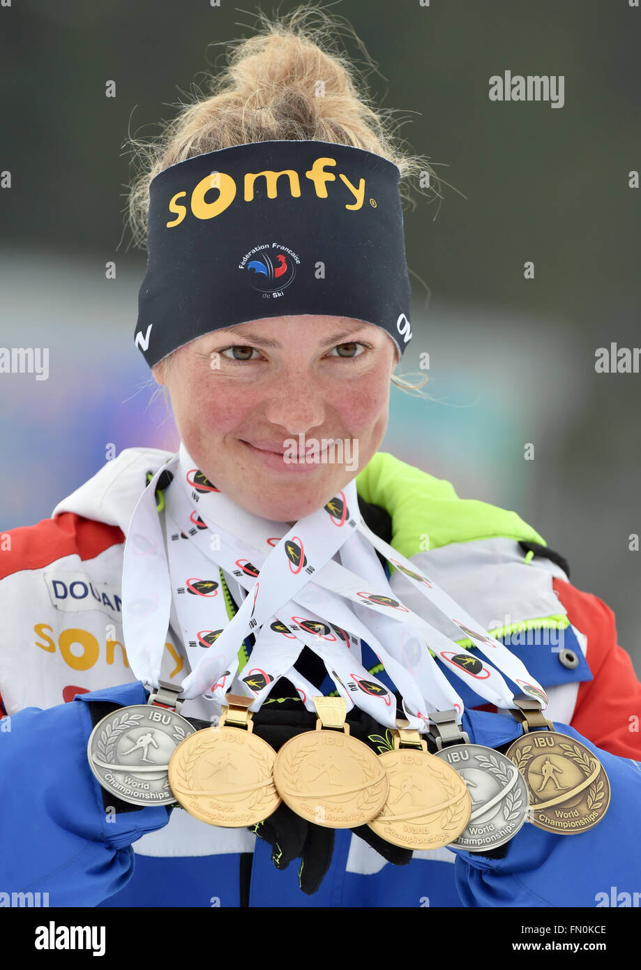 Female Biathlete Marie Dorin Habert of France shows her six medals ...
