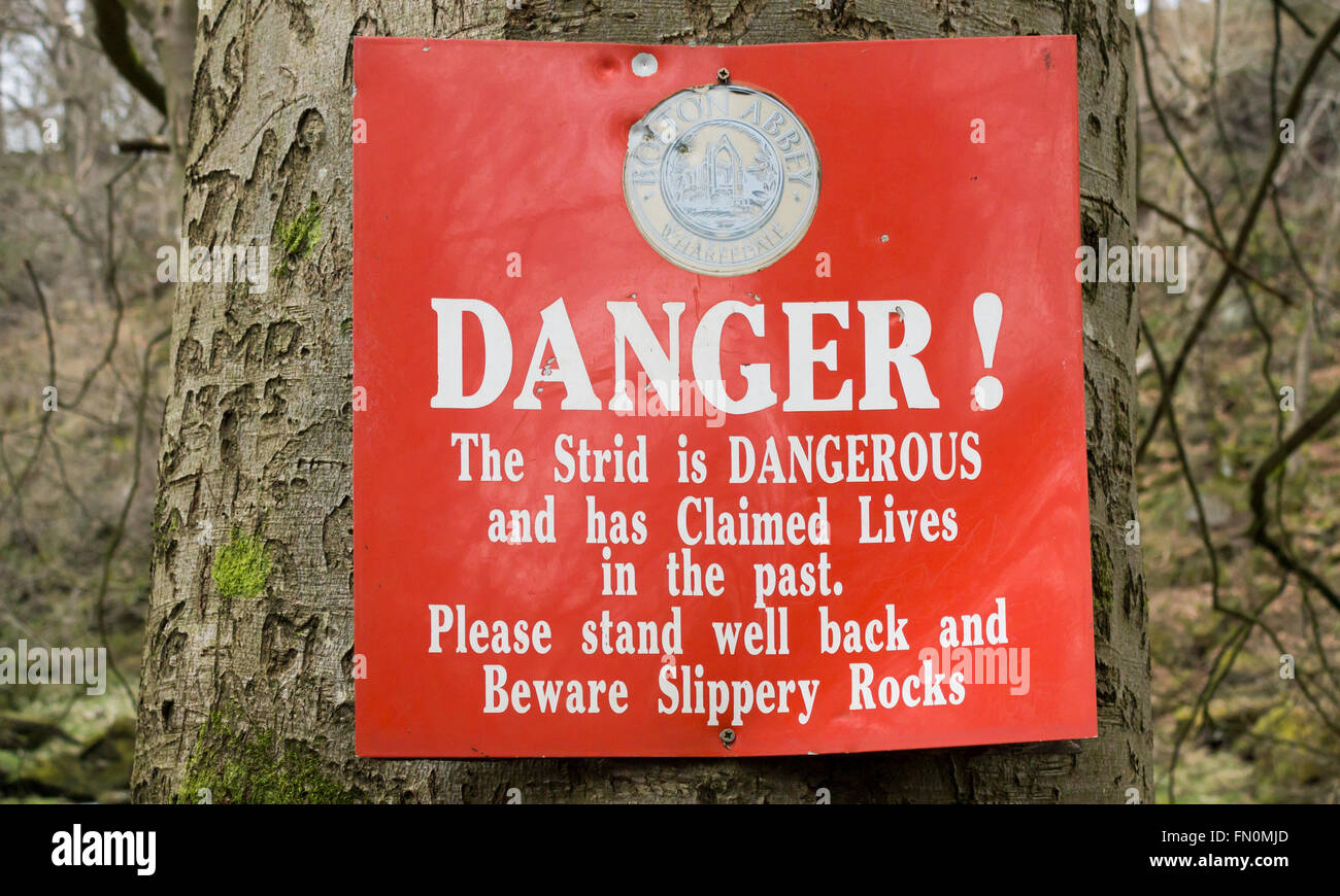 A notice warning about danger in Bolton Abbey Stock Photo - Alamy