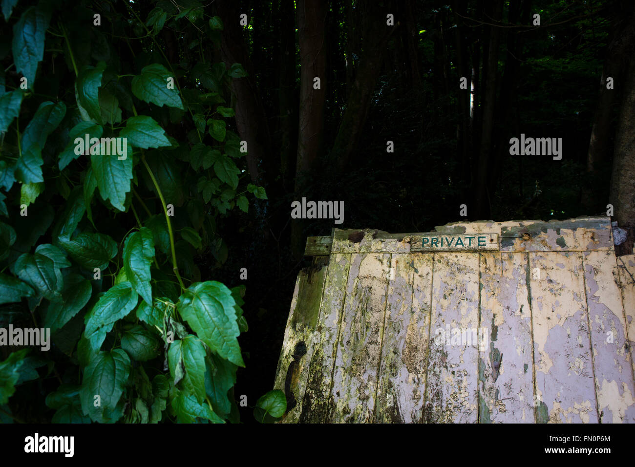 An old gate in a stone wall with private sign Stock Photo - Alamy