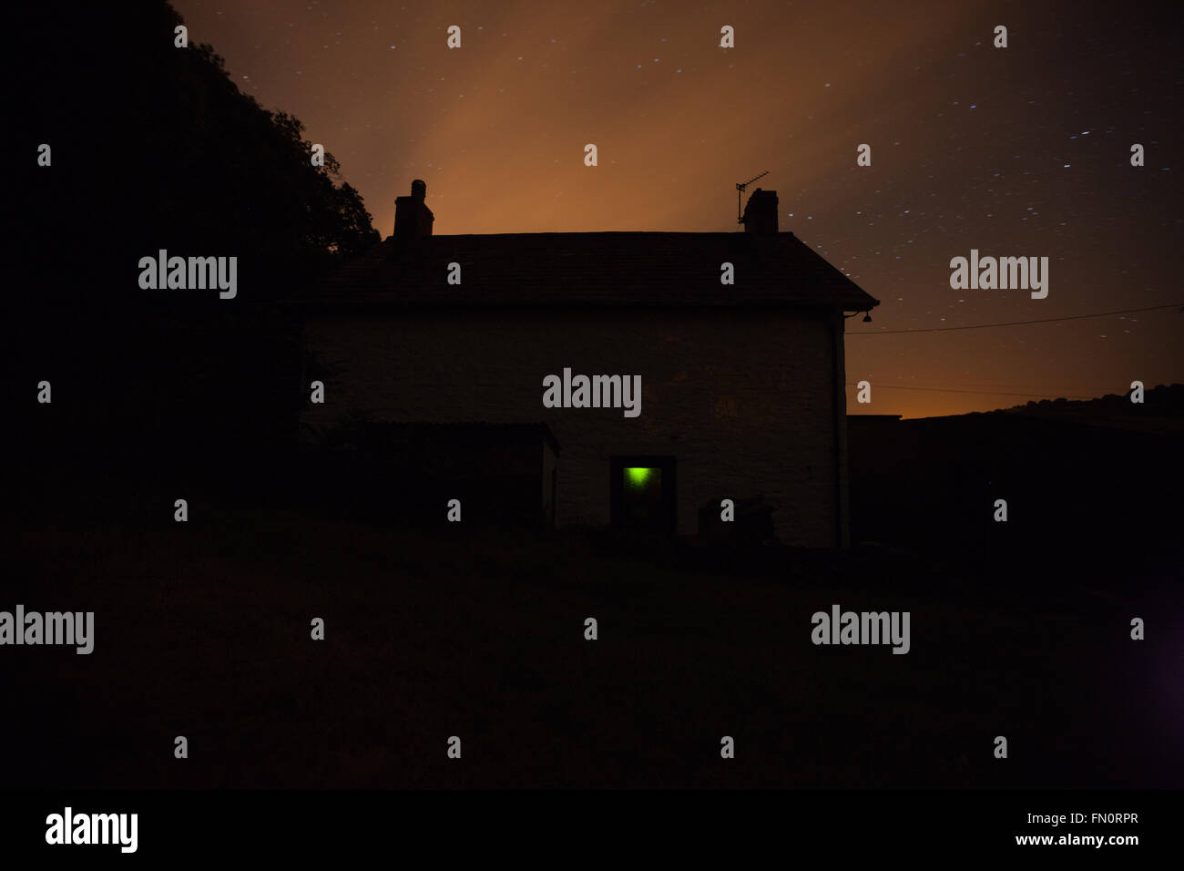 Light pollution in Carmarthenshire.Green light is from the on switch on ...
