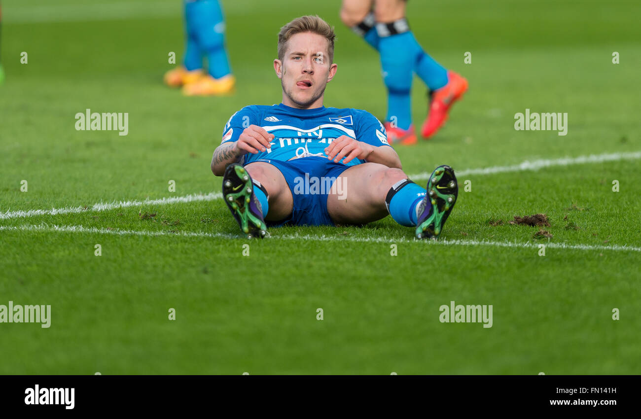 Leverkusen, Germany. 13th Mar, 2016. Hamburg's Lewis Holtby sits on the ...
