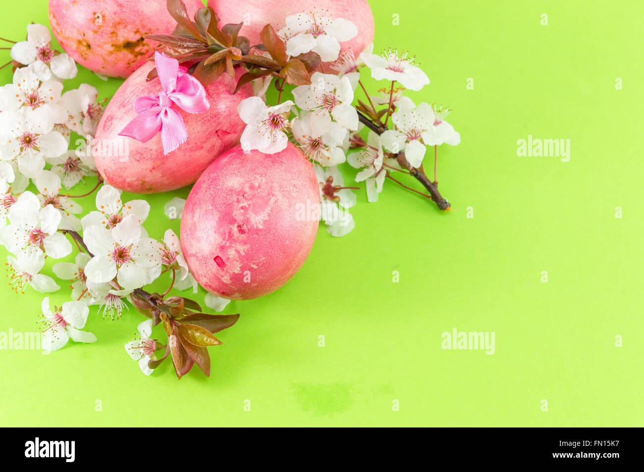 Painted Easter eggs in and cherry blossom flowers Stock Photo - Alamy