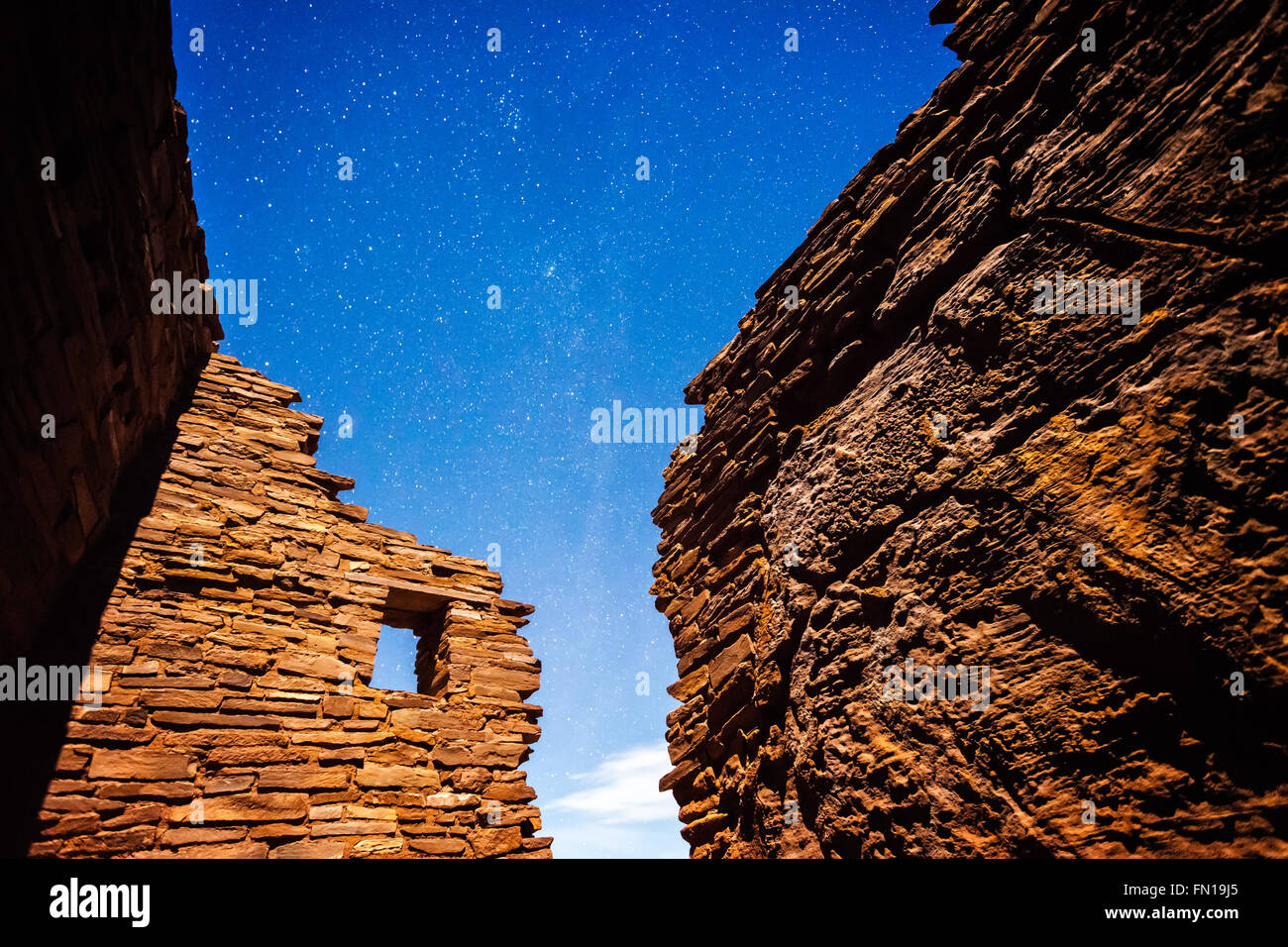 Stars in the sky at night above an 800 year old native american pueblo ...