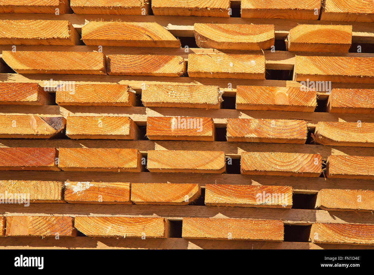 Stack of new wooden studs at the lumber yard Stock Photo - Alamy