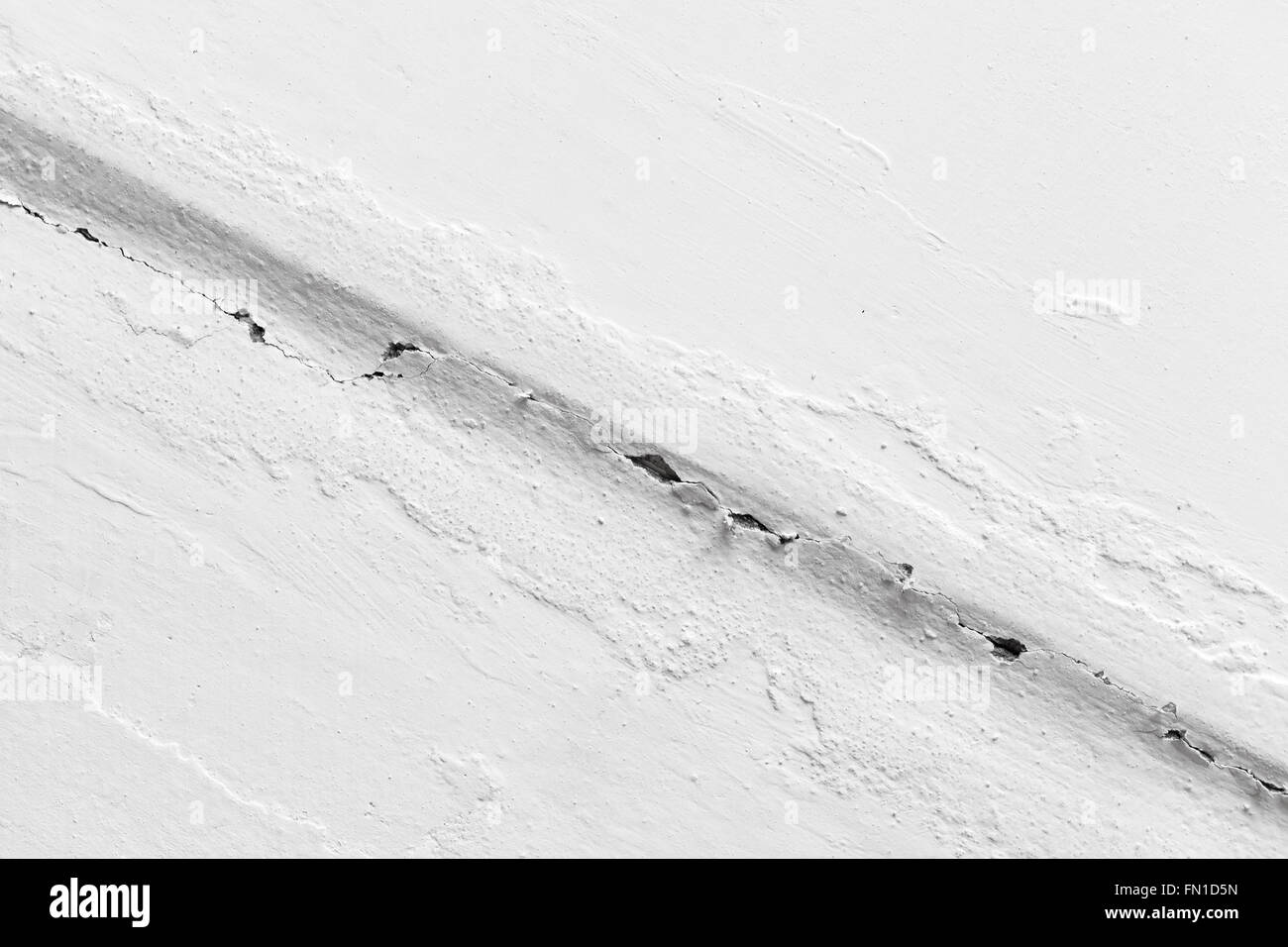 White crack painted wall Black and White Stock Photos & Images - Alamy