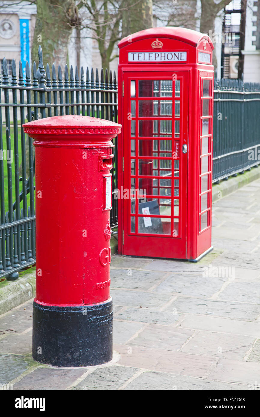 Famous red post box and telephone booth in London, UK Stock Photo - Alamy