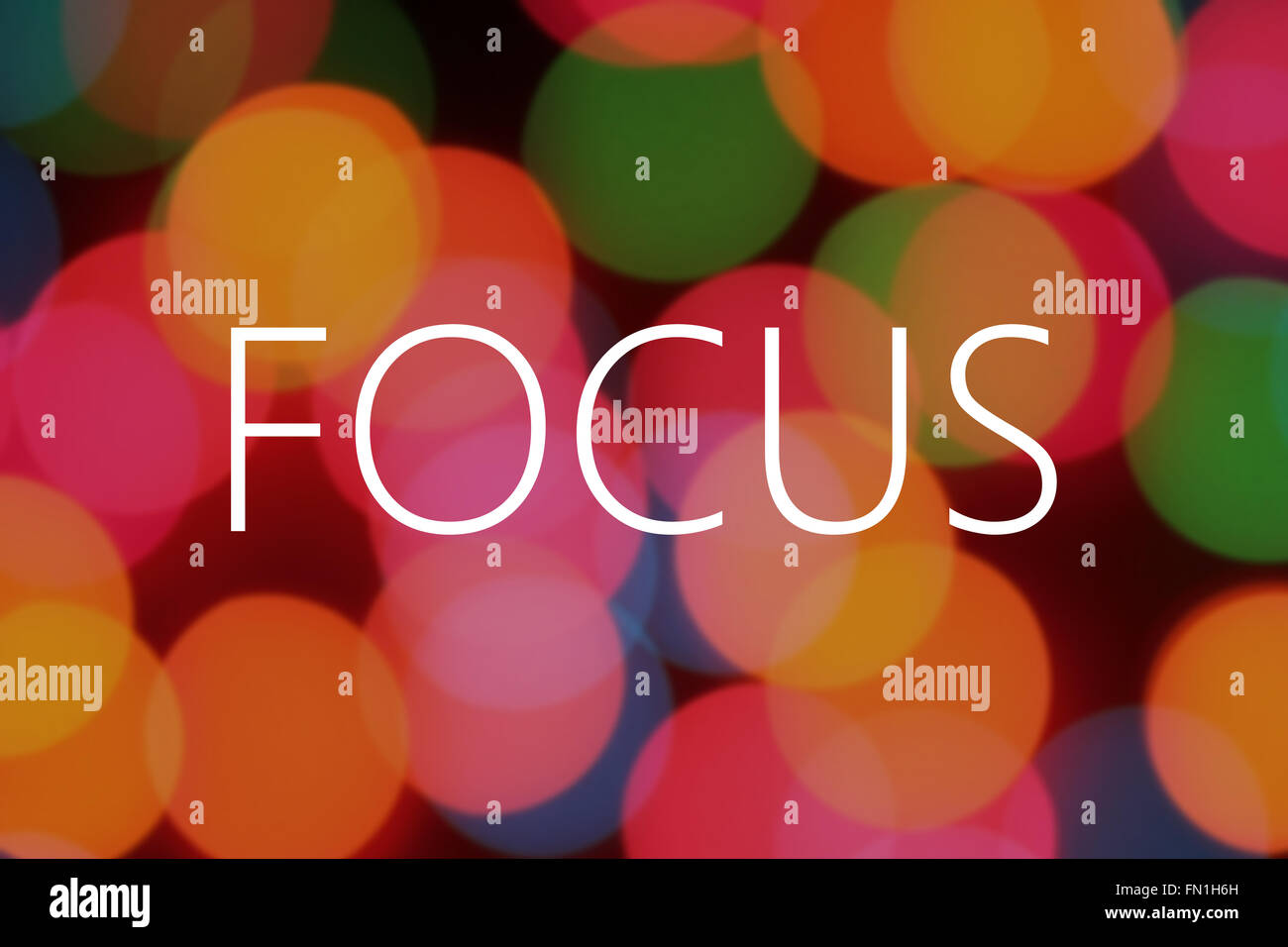 focus text on colorful bokeh background Stock Photo - Alamy