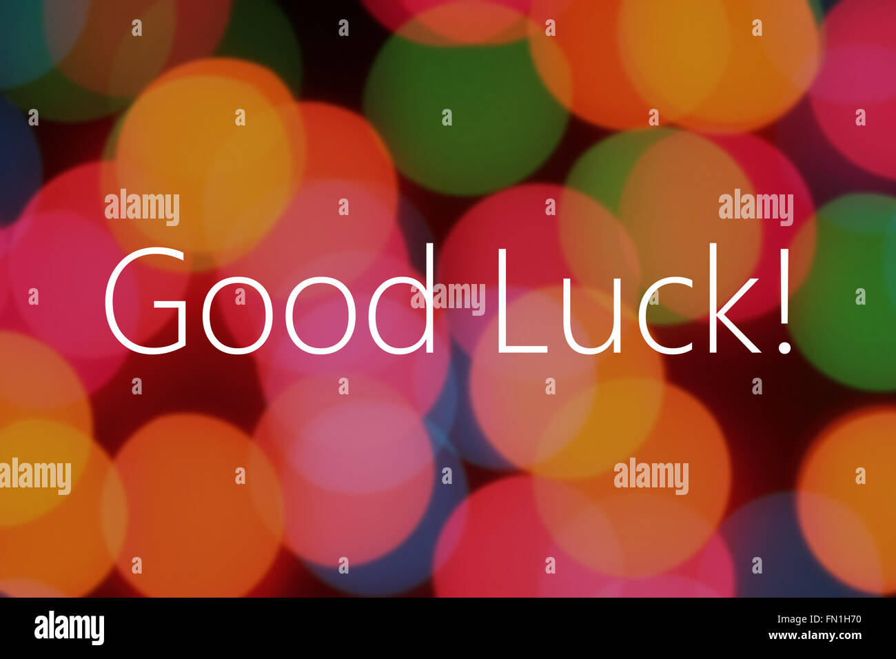 Good luck text on colorful bokeh background Stock Photo - Alamy