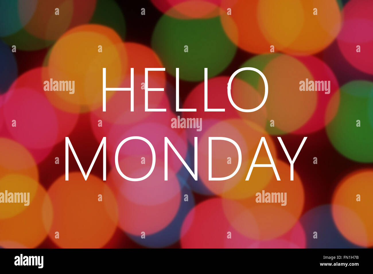 Hello Monday text on colorful bokeh background Stock Photo - Alamy