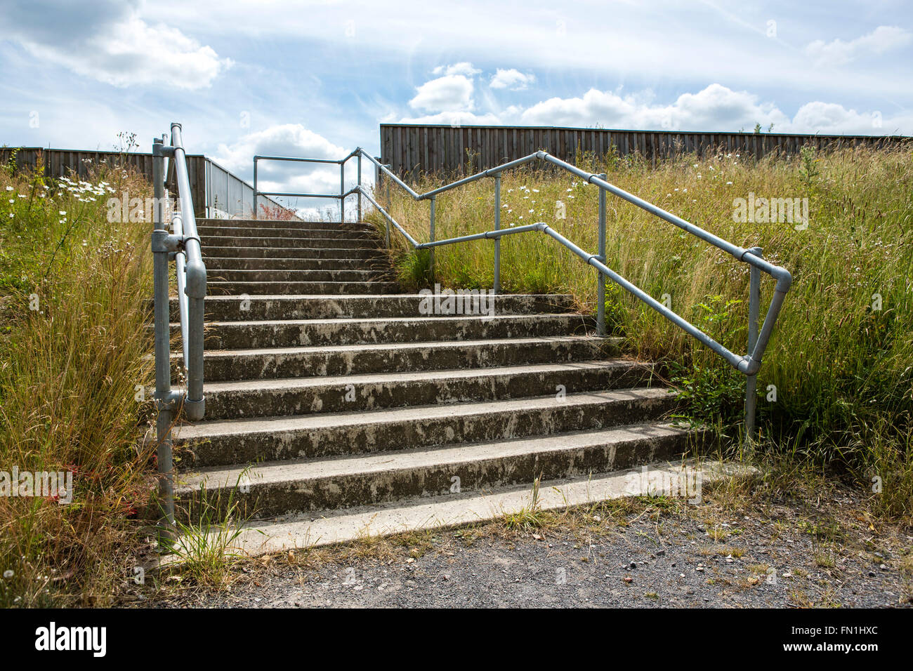 An old pathway over a road, empty and almost forgotton Stock Photo - Alamy
