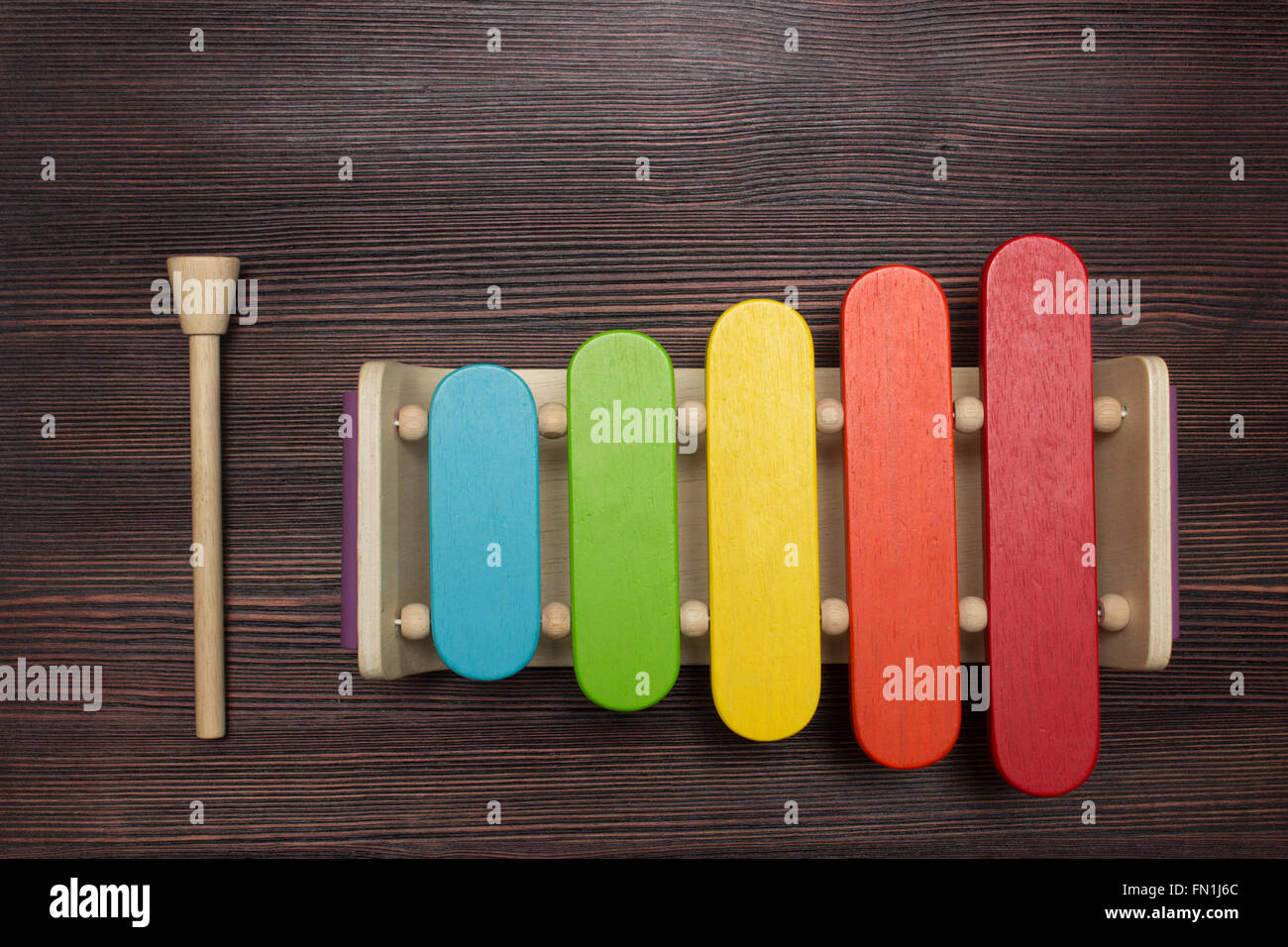 xylophone on a wooden background Stock Photo - Alamy