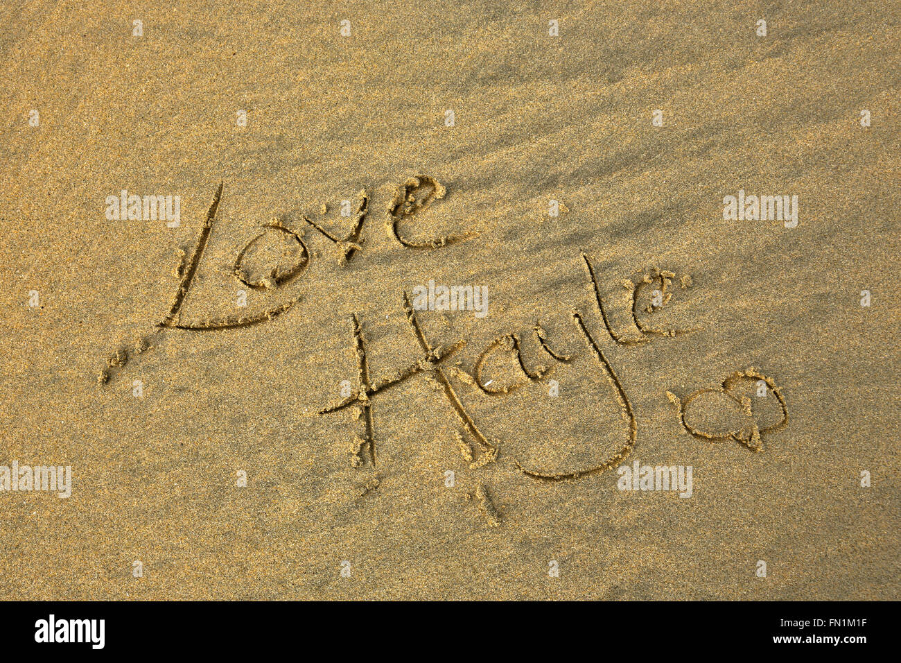 Message in the sand hi-res stock photography and images - Alamy