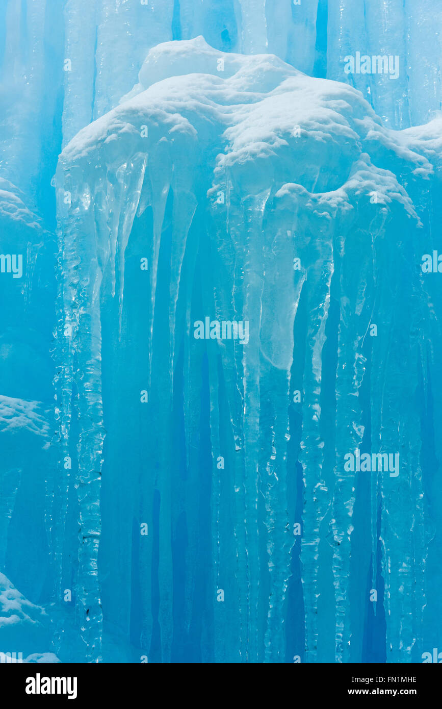 Translucent blue icicles in a frozen ice wall Stock Photo - Alamy