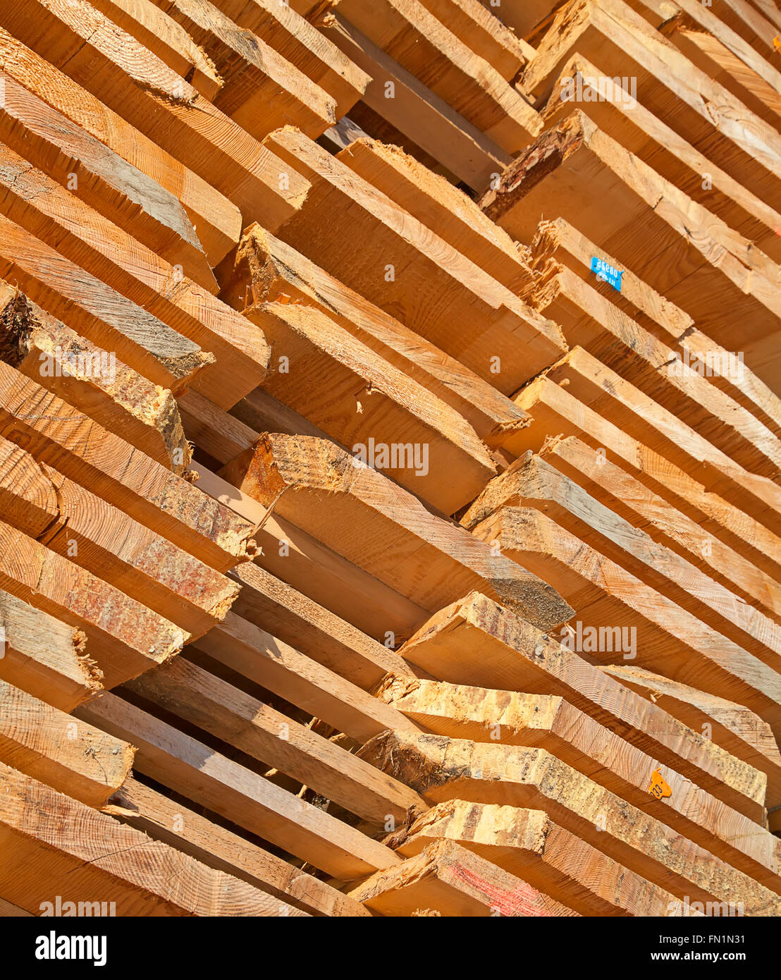 Stack of new wooden studs at the lumber yard Stock Photo - Alamy