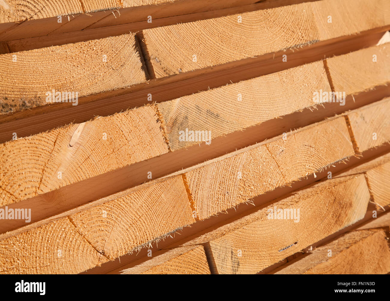 Stack of new wooden studs at the lumber yard Stock Photo - Alamy