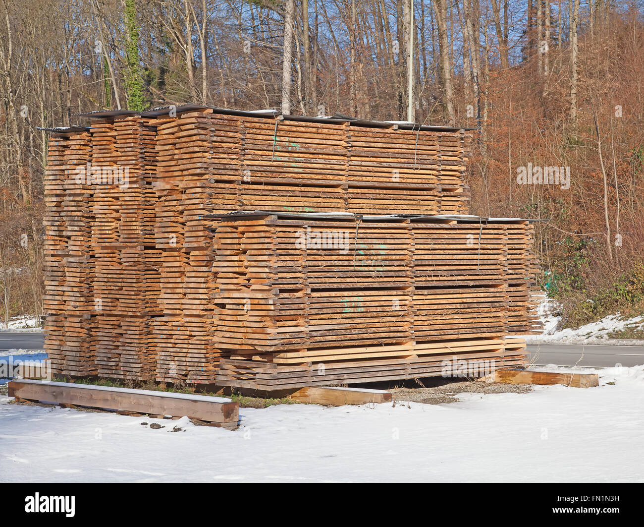 Stack of new wooden studs at the lumber yard Stock Photo - Alamy