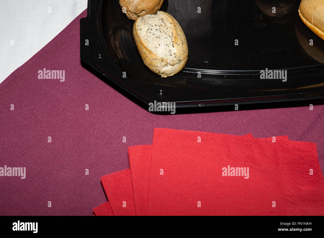 A plastic tray of bread rolls at a function or business meeting Stock ...