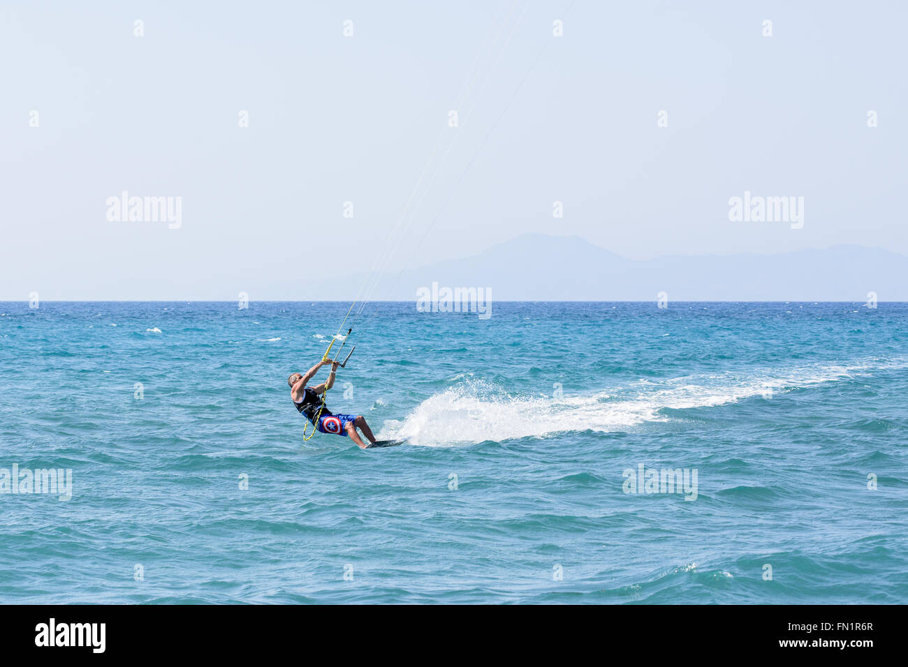 Kiter riding kite on hi-res stock photography and images - Alamy