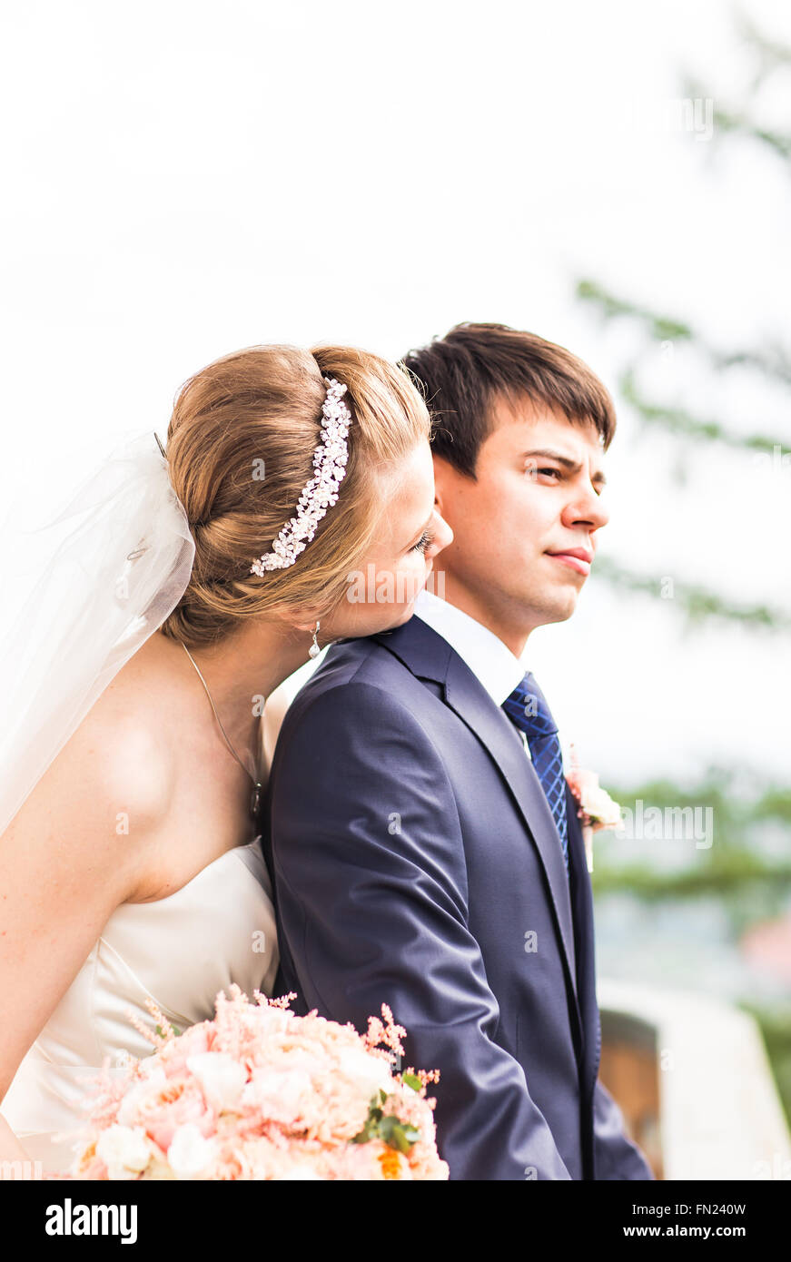 Wedding, Beautiful Romantic Bride and Groom Embracing Stock Photo - Alamy