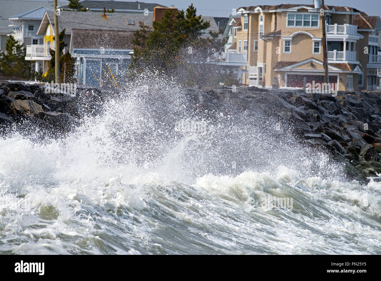 Large Waves hitting Seawall Stock Photo - Alamy