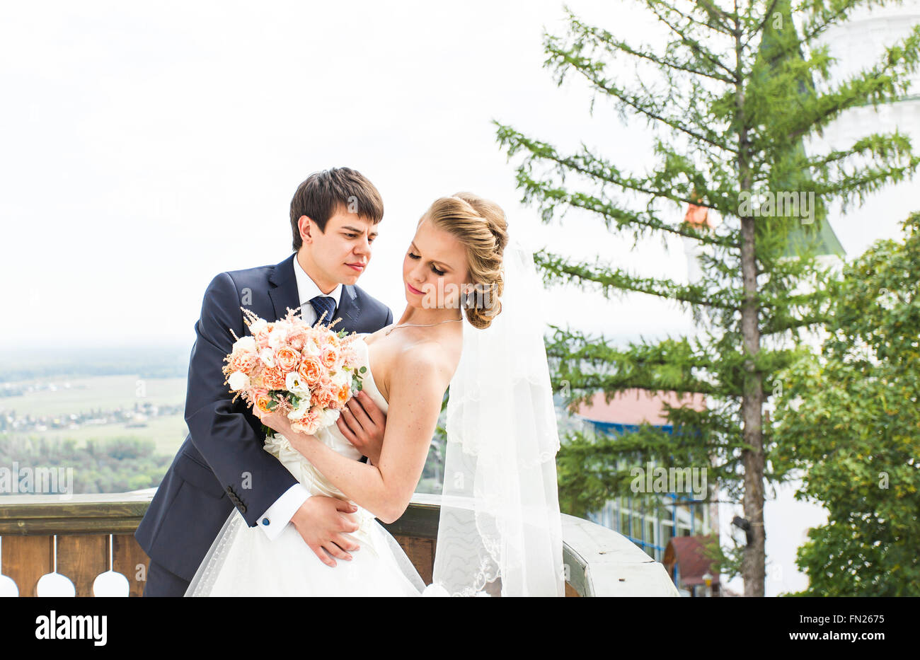 Wedding, Beautiful Romantic Bride and Groom Kissing Stock Photo - Alamy