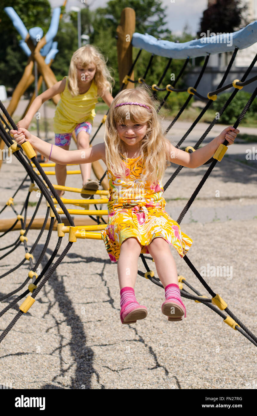 happy child playing outdoor on playground Stock Photo - Alamy
