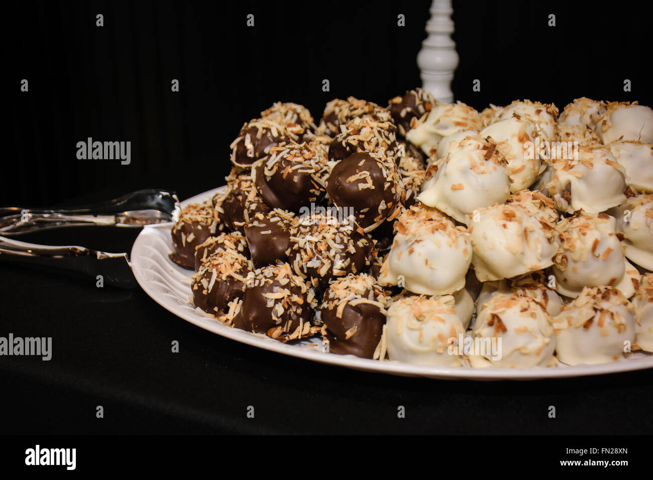 Truffles on a white plate Stock Photo - Alamy