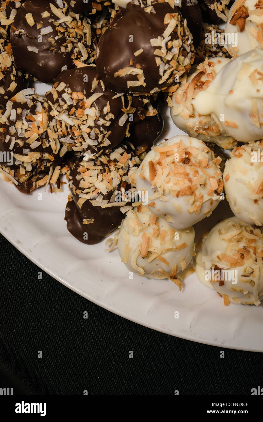 Truffles on a white plate Stock Photo - Alamy