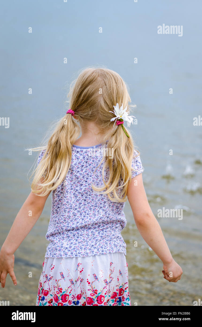 Girl throwing stones hi-res stock photography and images - Alamy