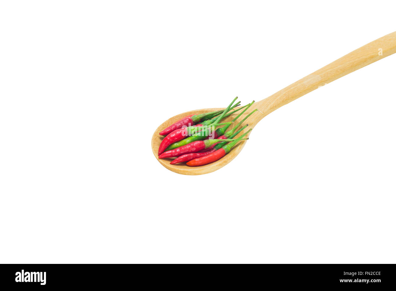 Red chili pepper in wooden spoon isolated on white background Stock ...