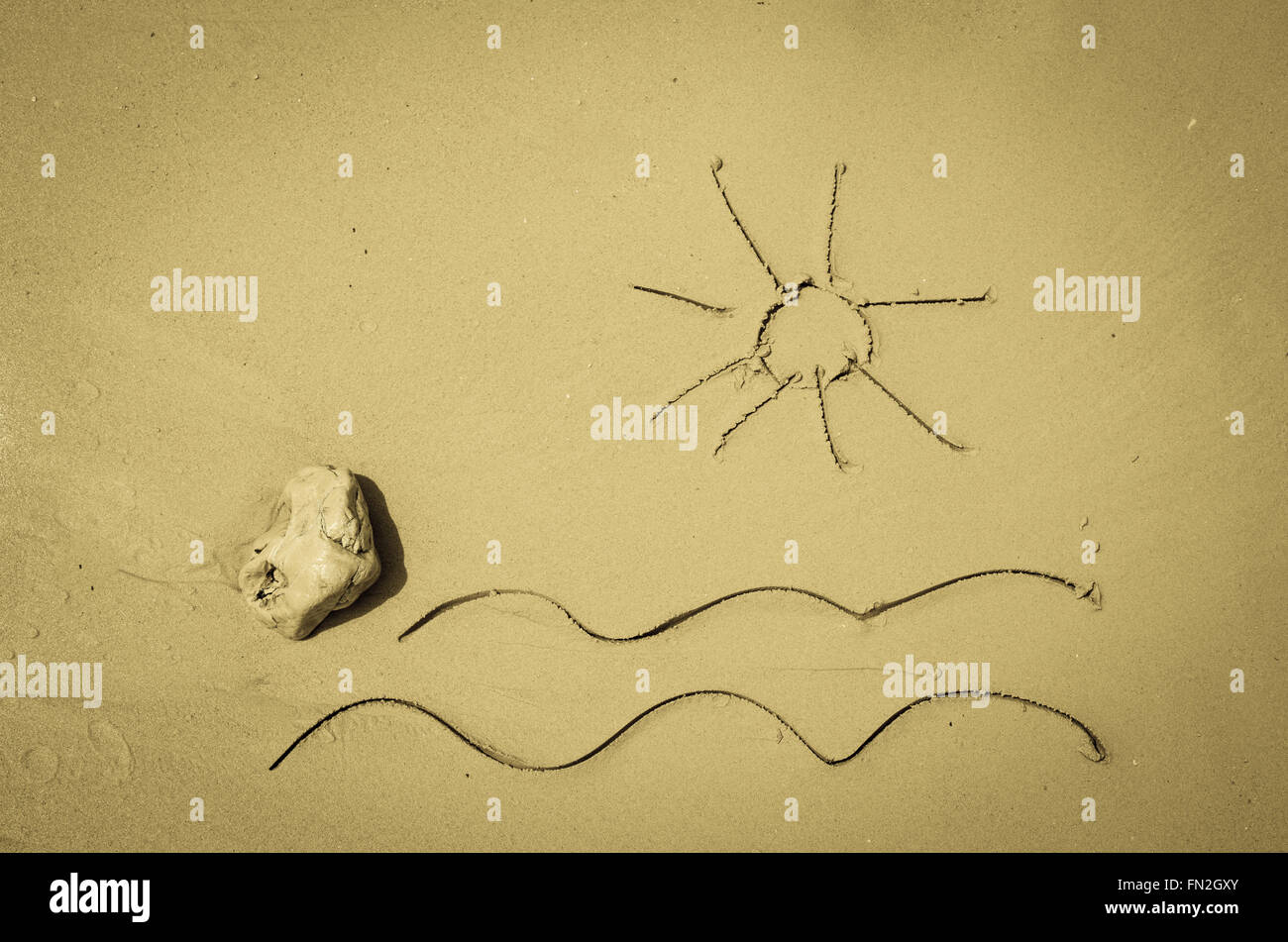 sun and waves in sand on beach Stock Photo - Alamy