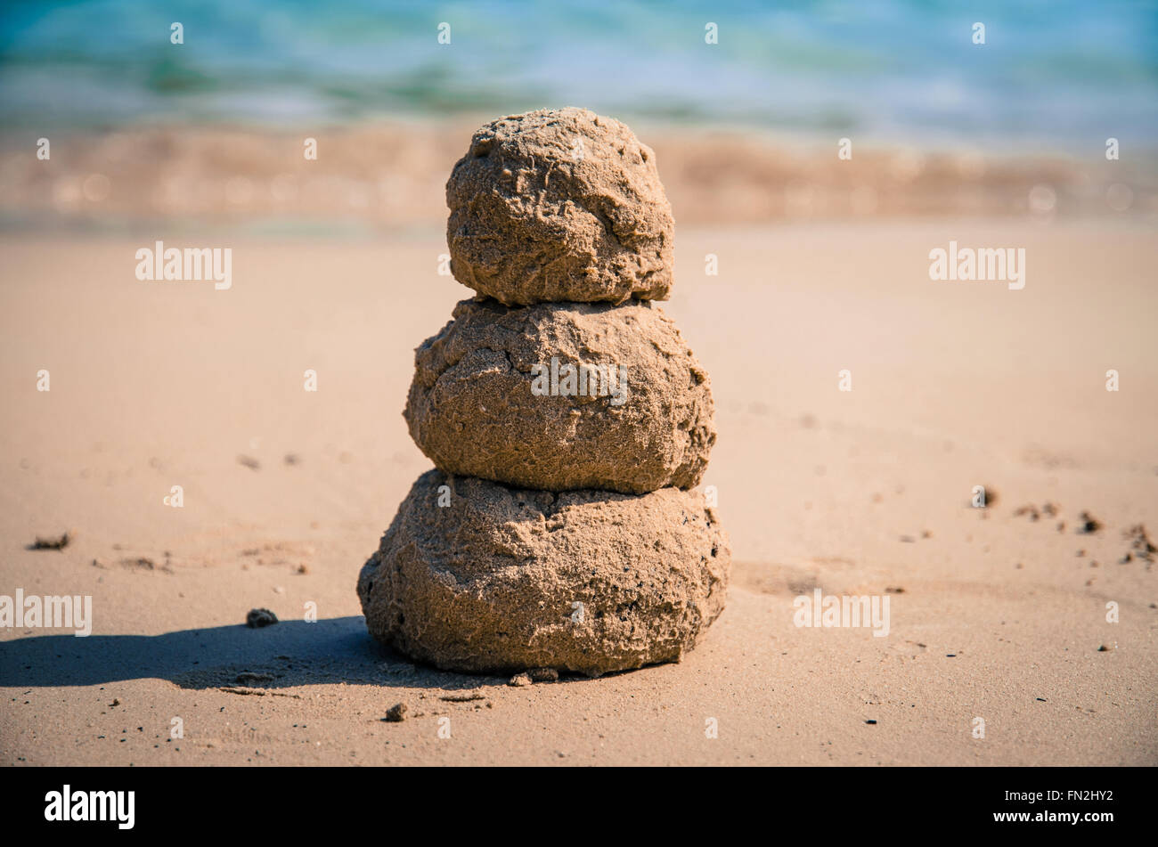 figure from sand on the seaside Stock Photo - Alamy