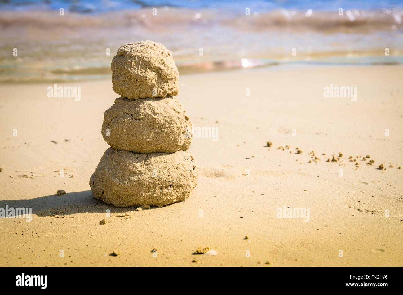 figure from sand on the seaside Stock Photo - Alamy